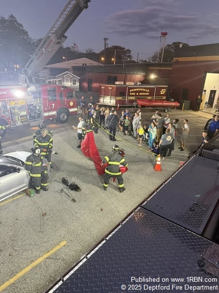 Firefighters Demonstrate Vehicle Extrication for Public