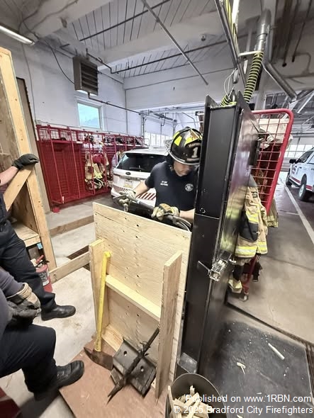Bradford Firefighters Review Door Mechanics and Tool Use.
