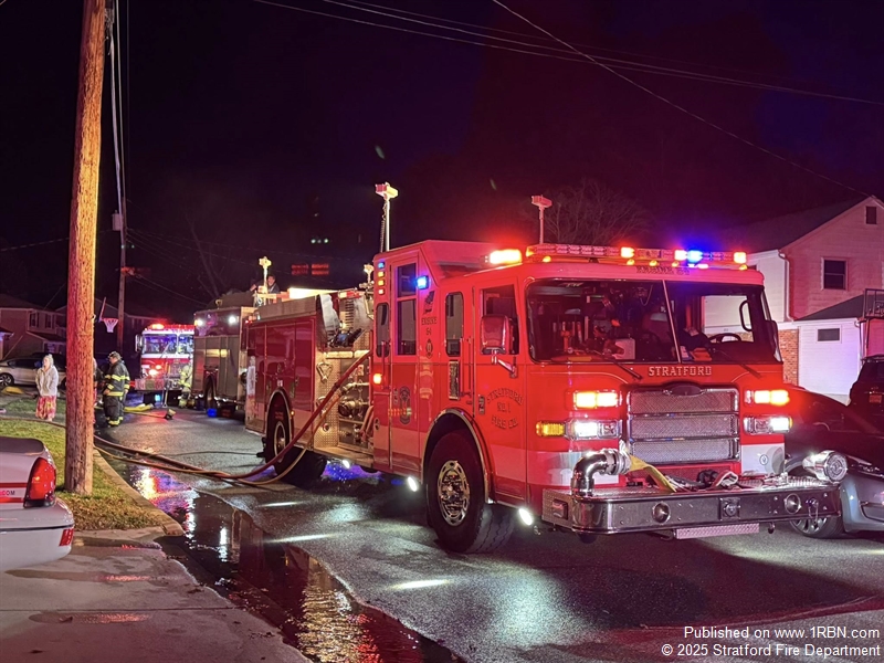 Engine 64 Makes Quick Stop at Garage-to-House Fire